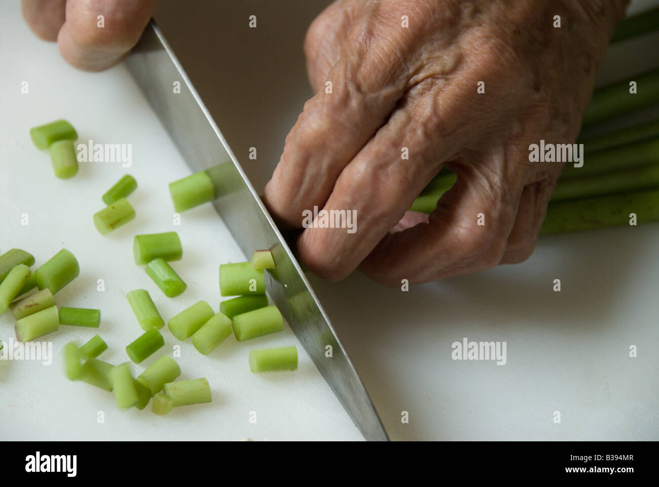 Old Hands, Chopping Stock Photo - Alamy