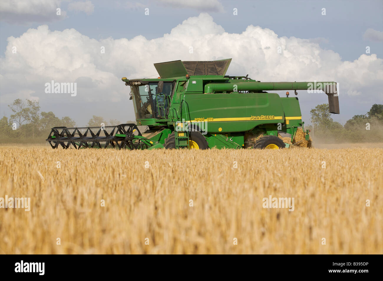 John deere combine harvester harvesting barley hi-res stock photography ...
