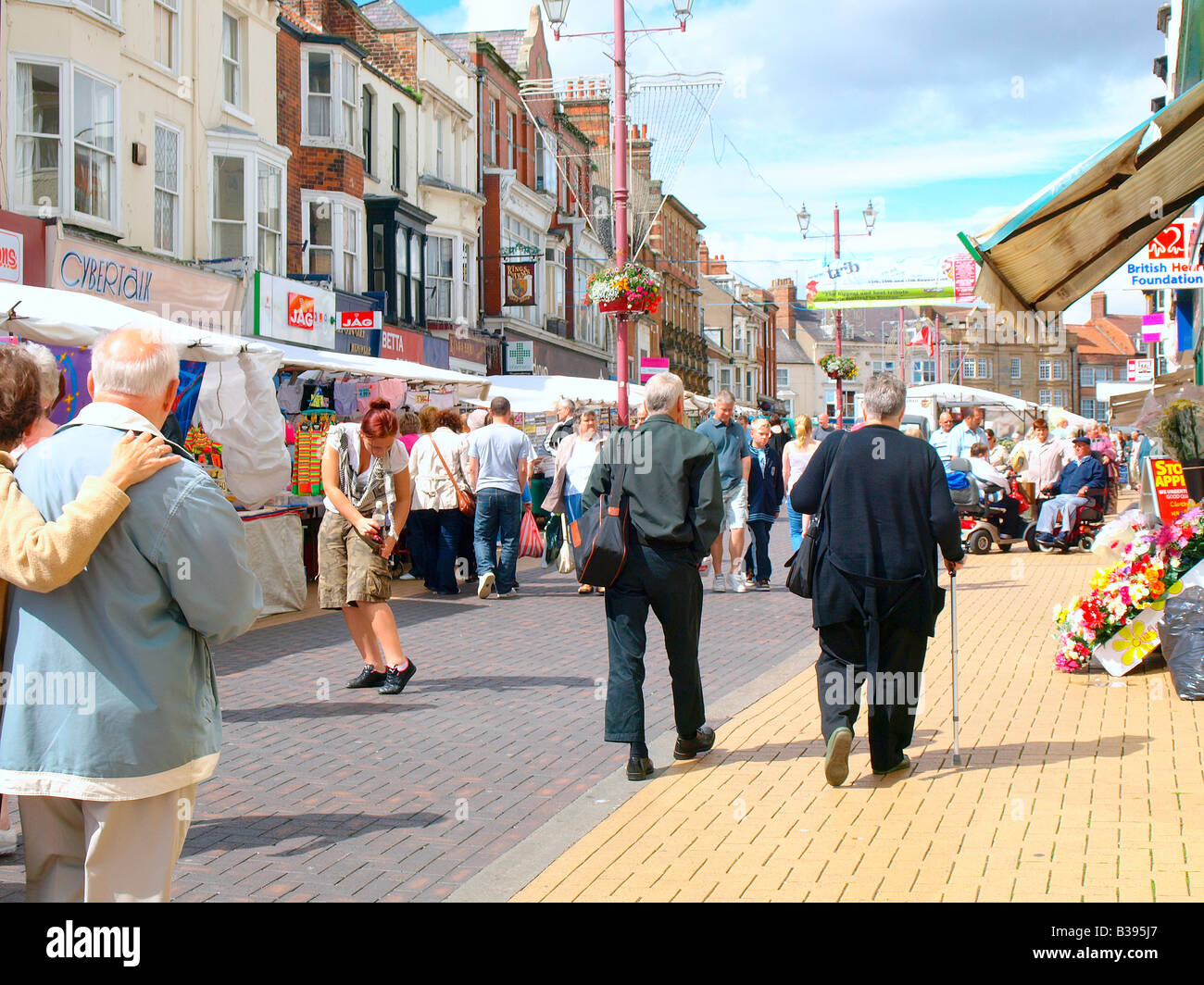 A busy shopping street with market at Bridlington,North Yorkshire,uk ...