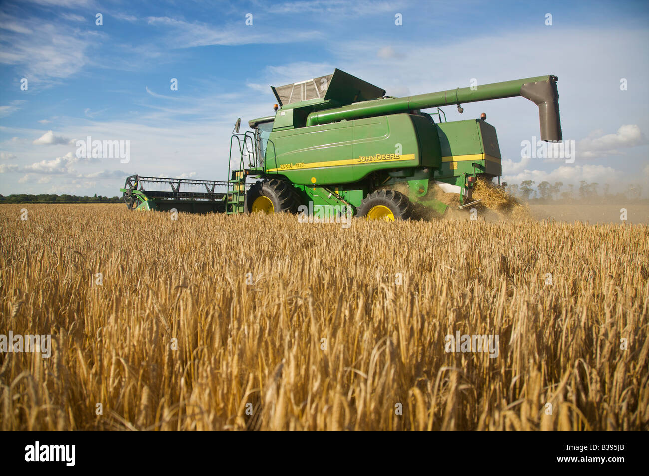 John Deere Combine Harvester Harvesting Barley High Resolution Stock ...