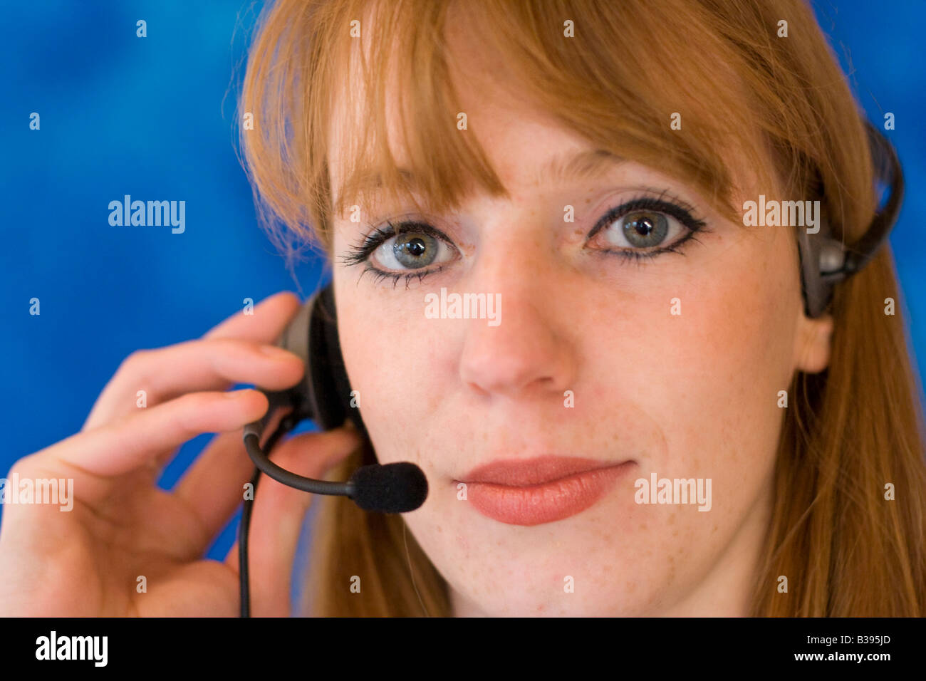 Young serious female receptionist hi-res stock photography and images ...
