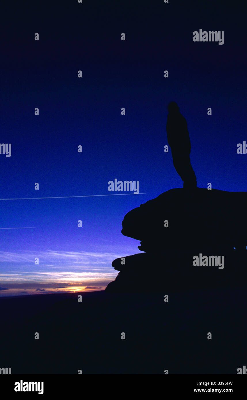 Watching the sun set at Brimham rocks Stock Photo - Alamy