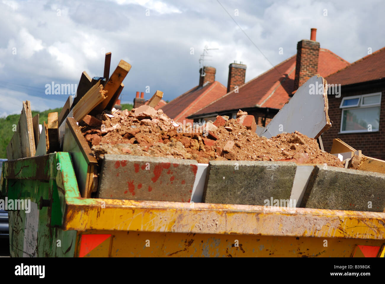 Skip for builders waste Stock Photo - Alamy