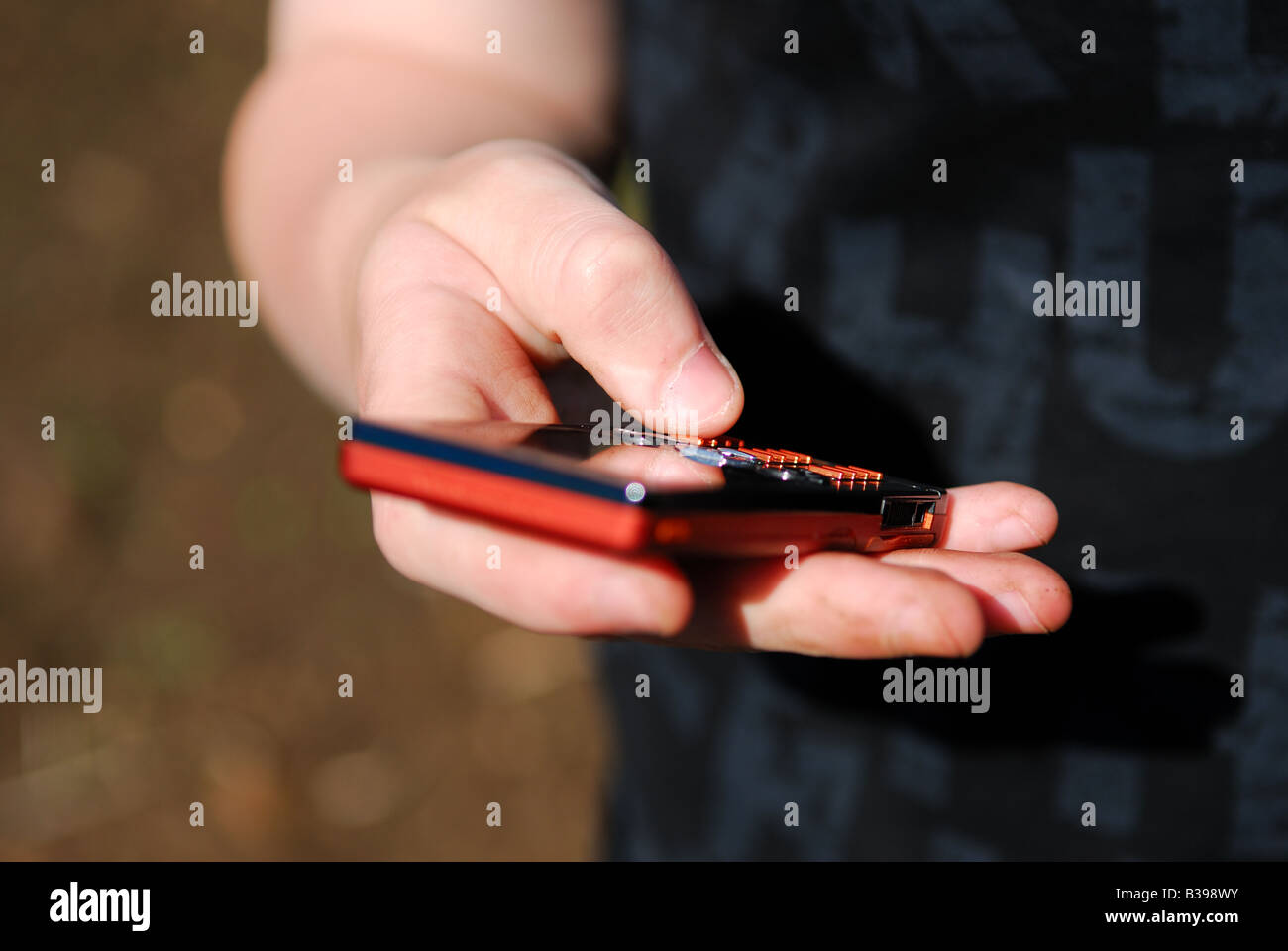 Texting on mobile telephone Stock Photo - Alamy