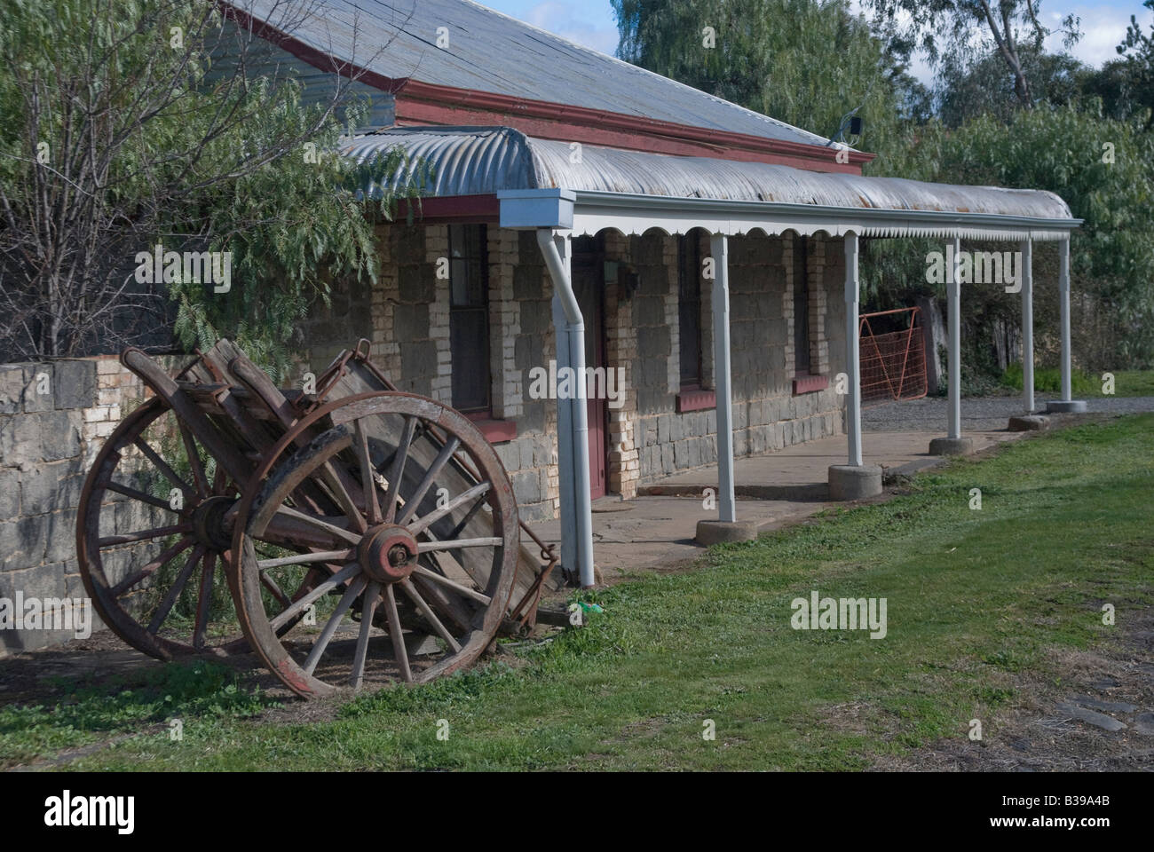 A traditional old homestead with bullnose veranda and bluestone walls ...