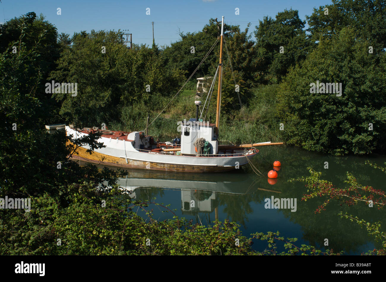 Boat moored in Lydney harbour Stock Photo - Alamy