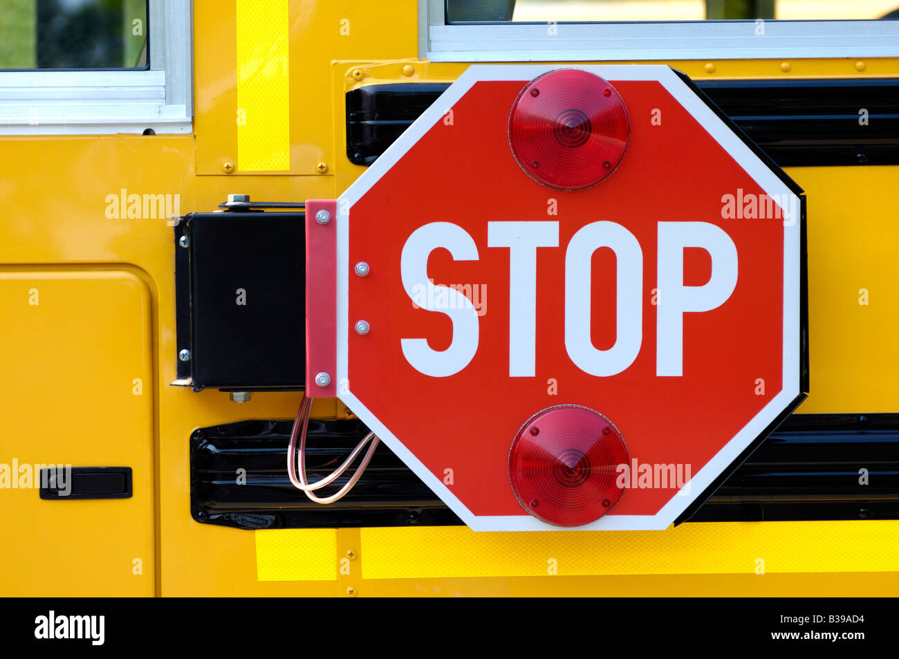 Stop sign on a school bus Stock Photo - Alamy