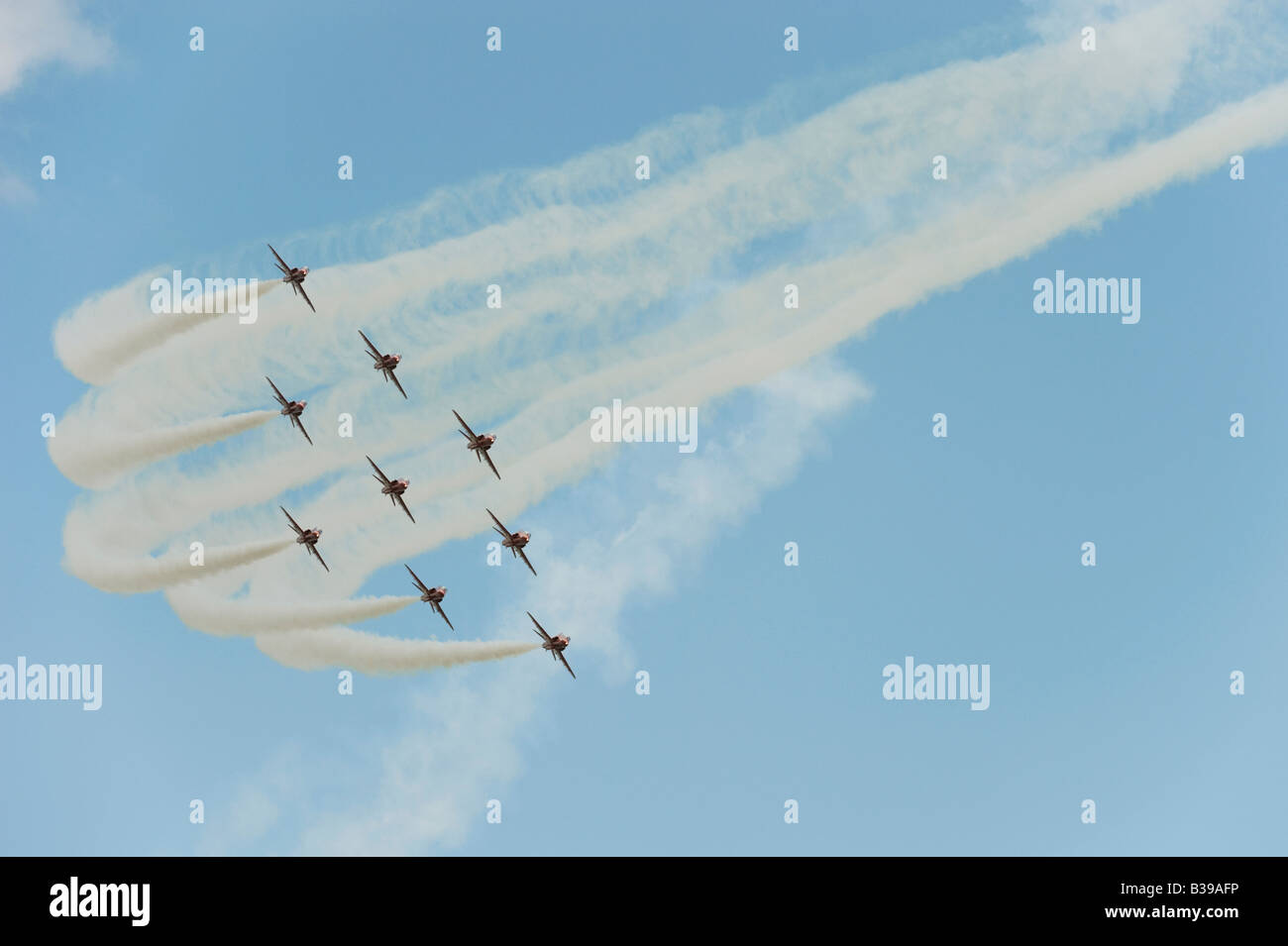 Royal Air Force Aerobatic Team, The Red Arrows with smoke trails Stock ...
