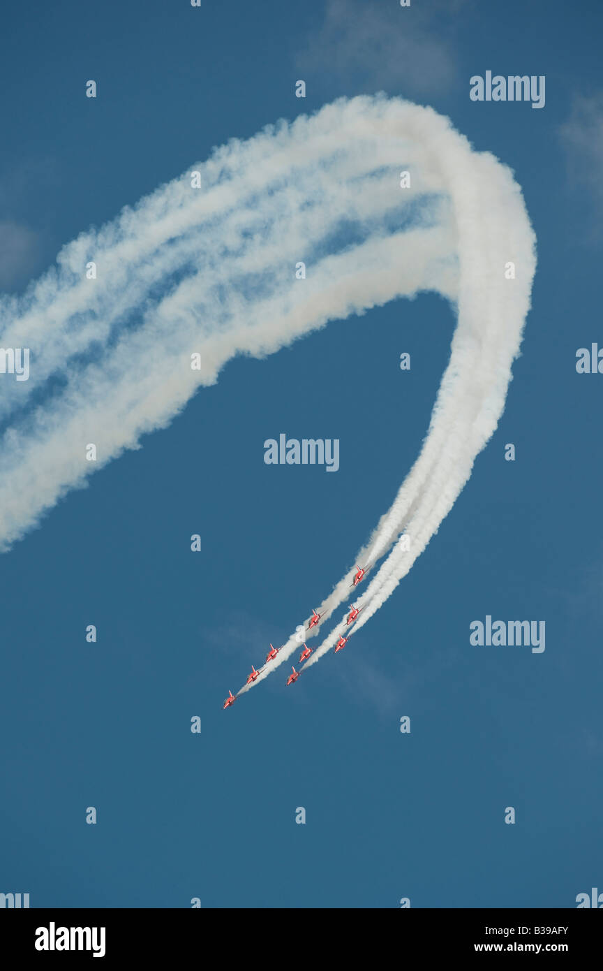 Royal Air Force Aerobatic Team, The Red Arrows with smoke trails Stock ...