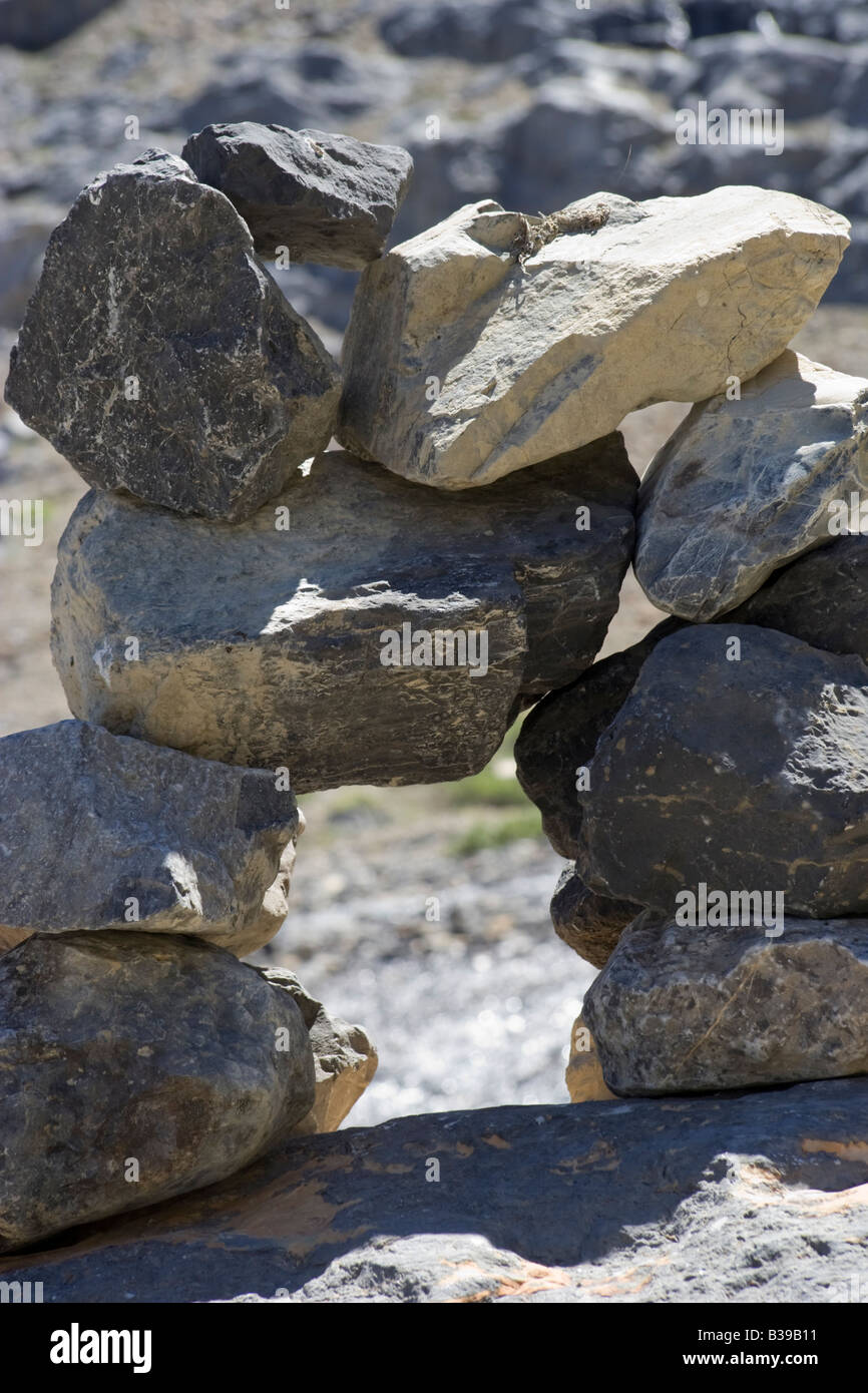 stack of rocks in the rocky mountains - guidance for hikers in the ...