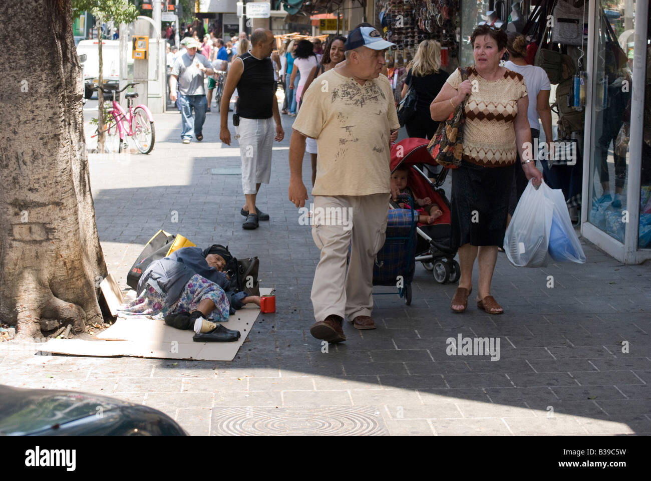 Israel Tel Aviv Homeless woman begging for money Stock Photo - Alamy