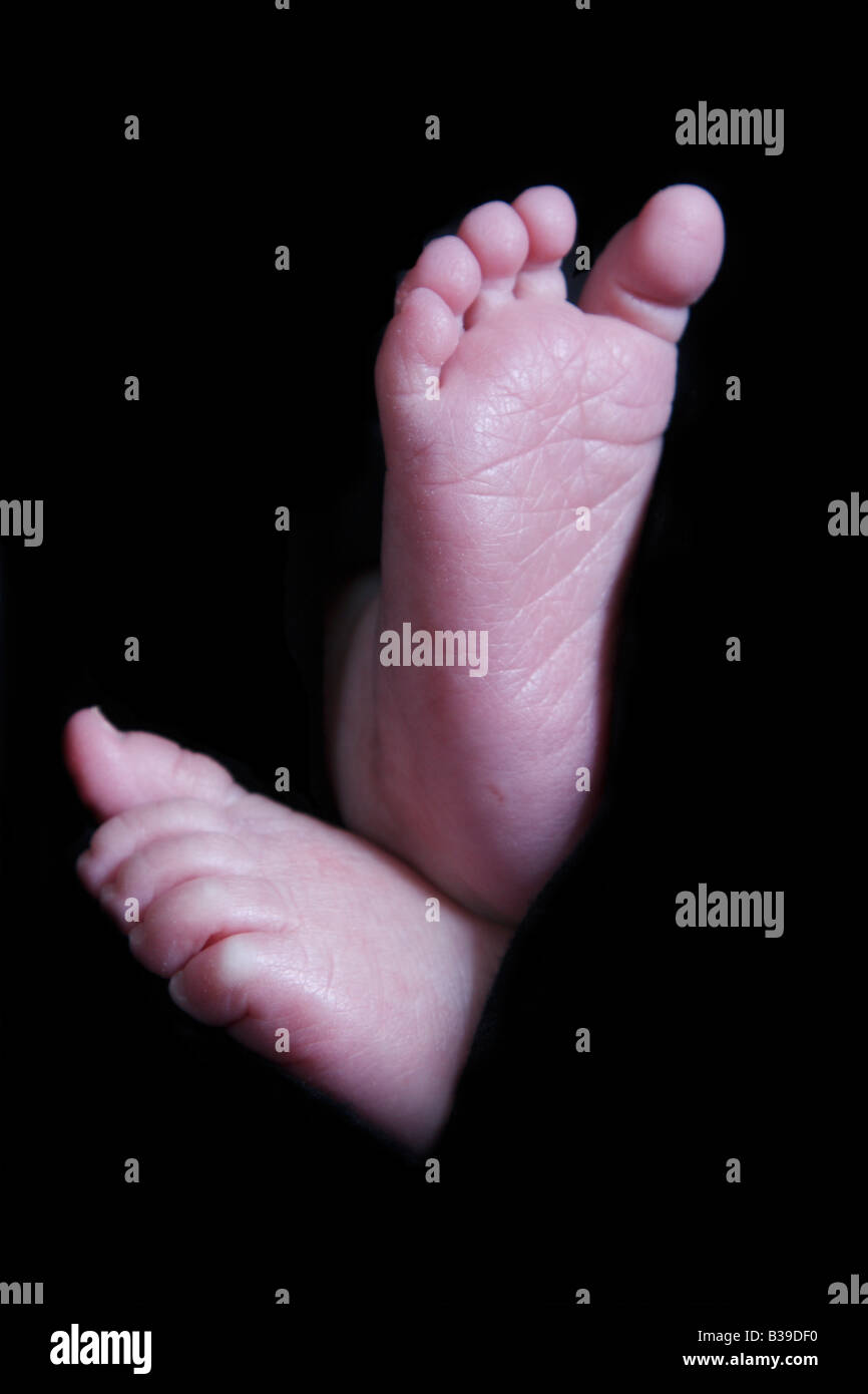 Baby Feet with Black Background Stock Photo - Alamy