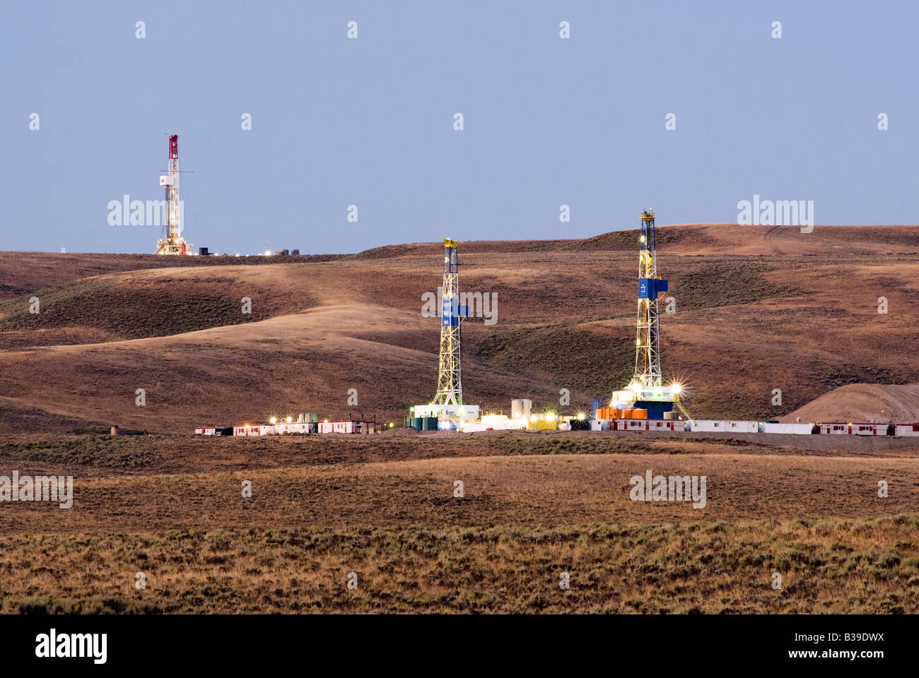 new oil and gas drilling activity at dawn in Wyoming Stock Photo - Alamy
