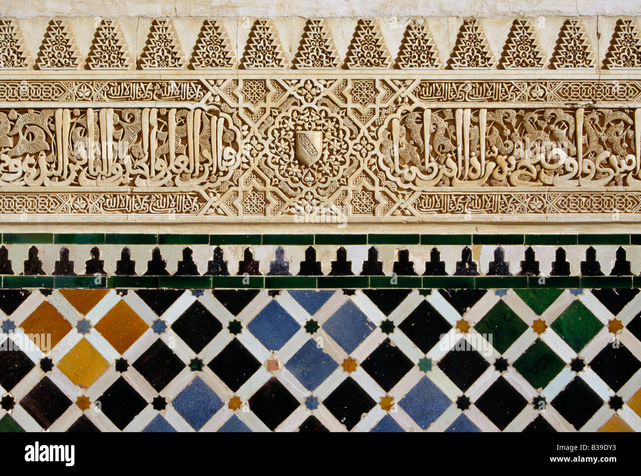 Mudejar tiles stucco wall at Court of Myrtle Tree Alhambra at Granada ...