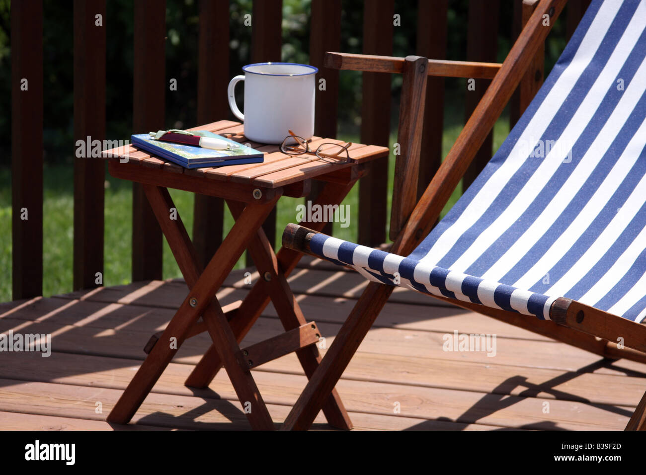 Writing stationary while sitting on the deck in summer Stock Photo - Alamy