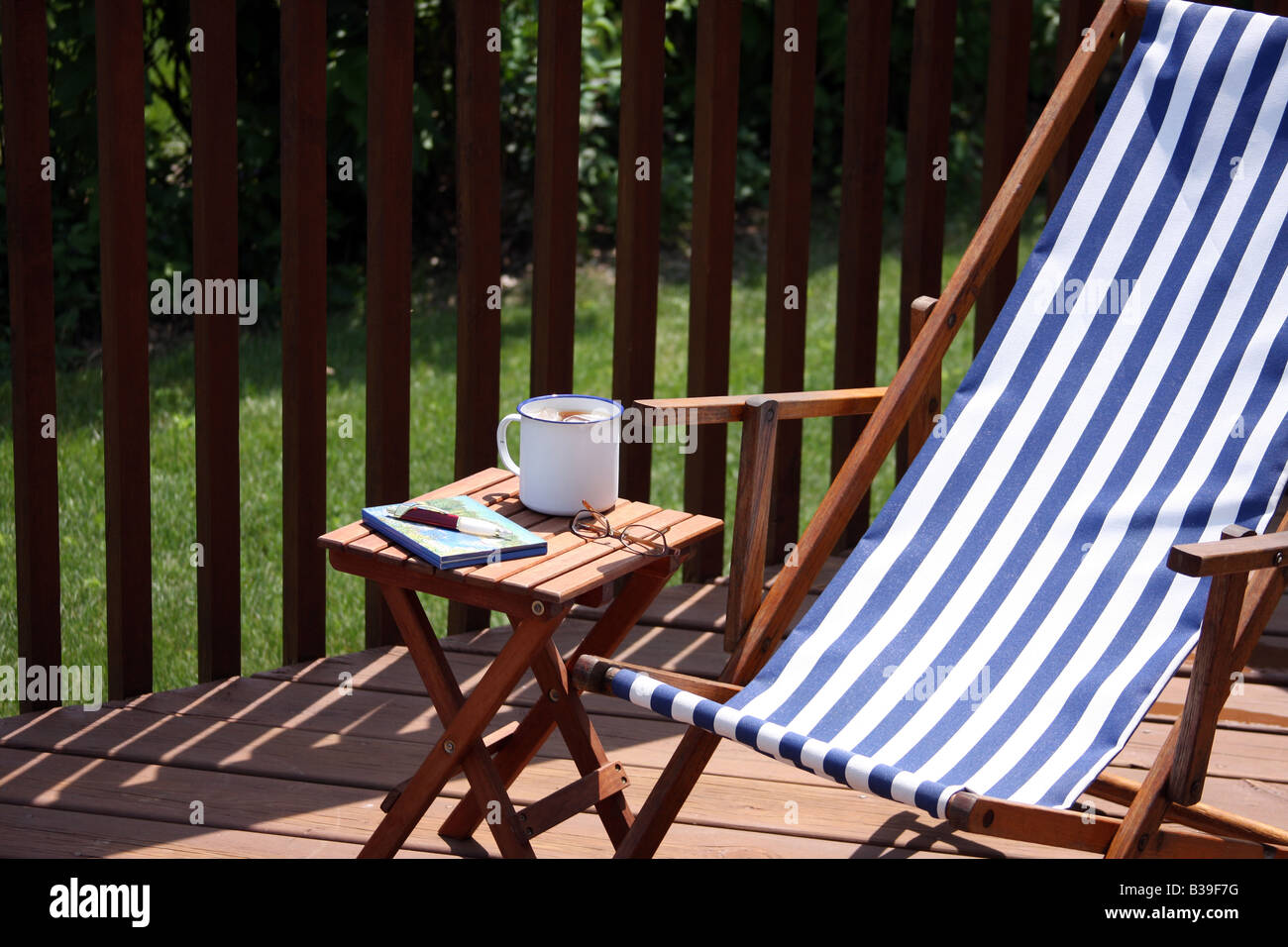 Writing stationary while sitting on the deck in summer Stock Photo - Alamy