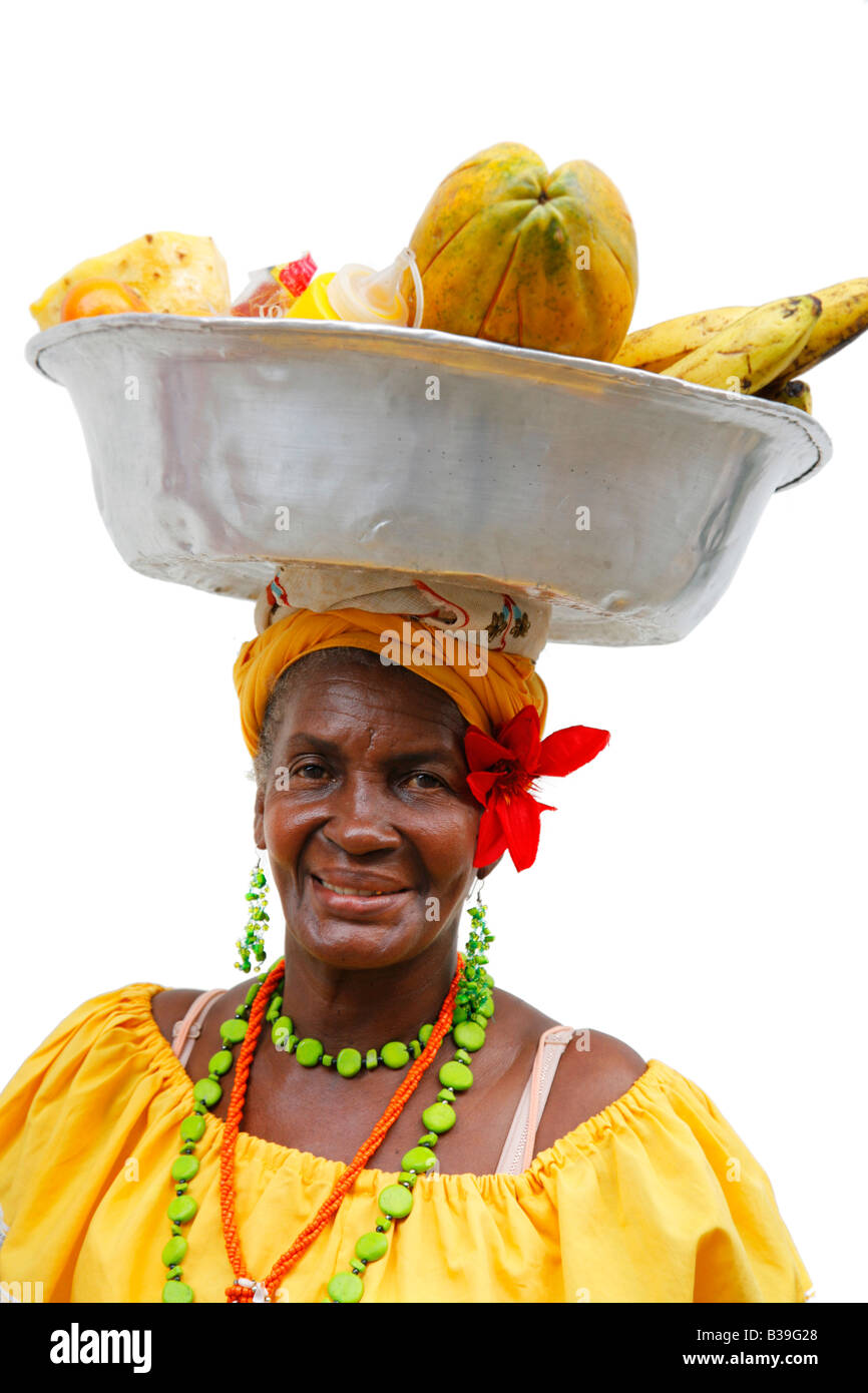 Afrocolombian woman dressed in traditional clothes with a basket of ...