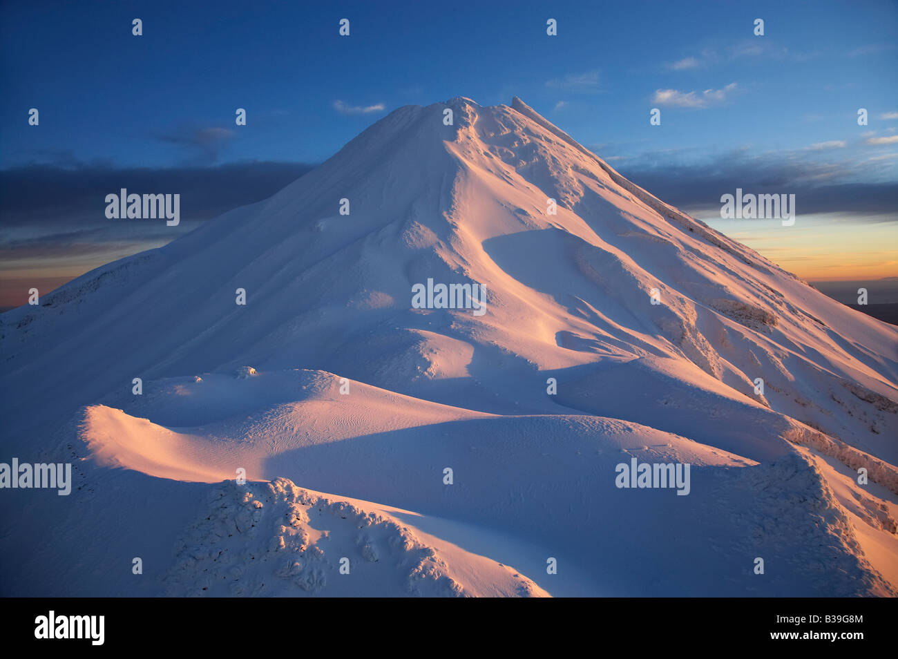 Syme Hut at left Fanthams Peak and Alpenglow at Dawn on Mt Taranaki Mt ...