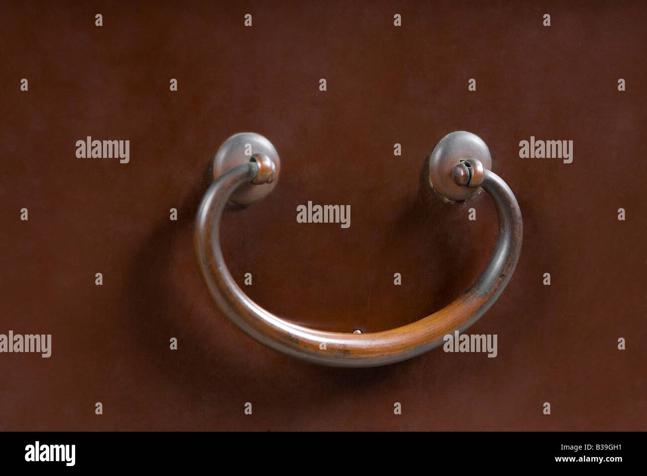 Close up of antique drawer handle Stock Photo - Alamy