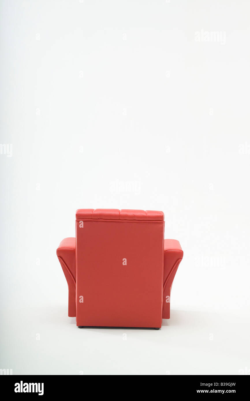 Rear view of red sofa Stock Photo - Alamy