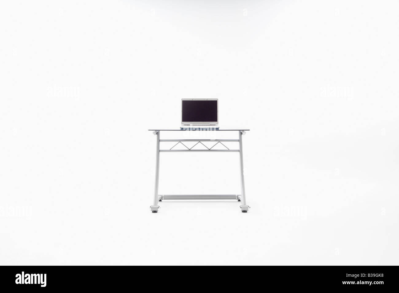 Laptop computer on desk Stock Photo - Alamy