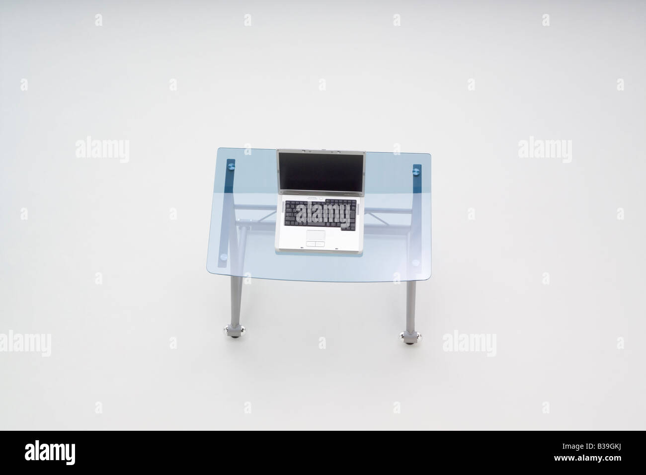 Laptop computer on desk Stock Photo - Alamy