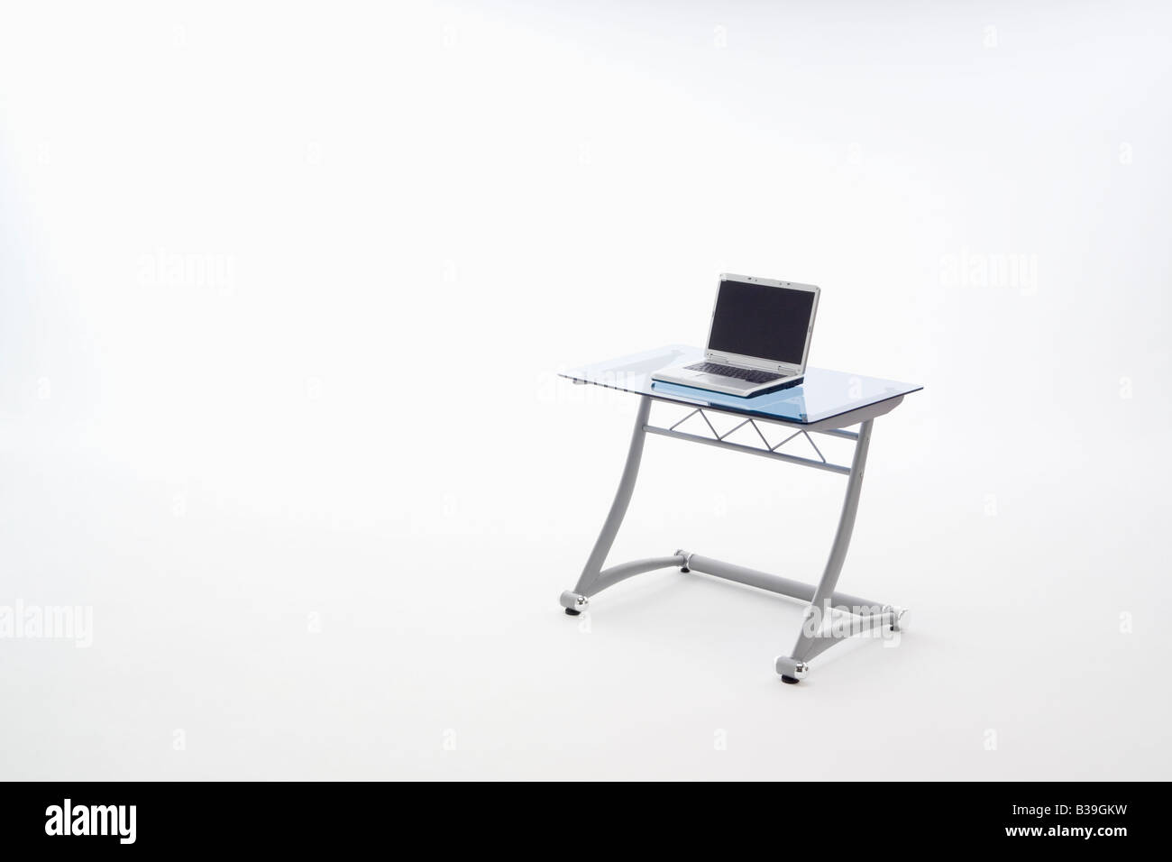 Laptop computer on desk Stock Photo - Alamy