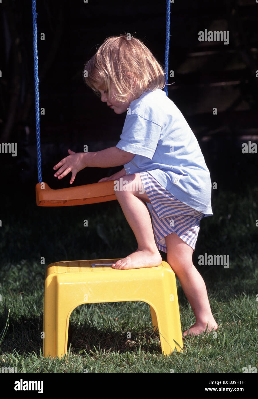 Climbing on a stool hi-res stock photography and images - Alamy