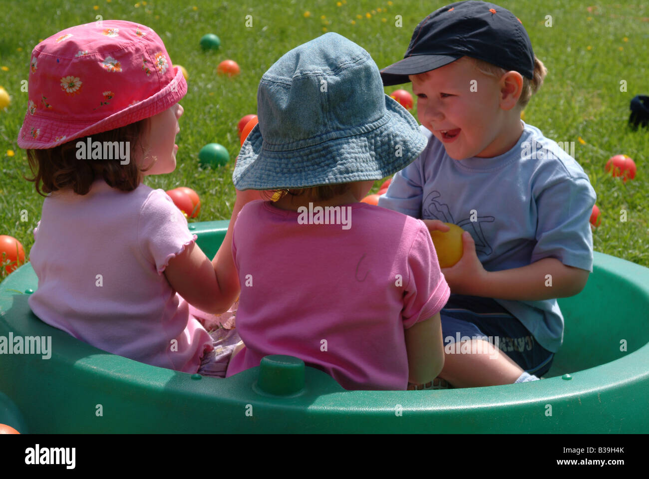 Small group of children playing together Stock Photo - Alamy