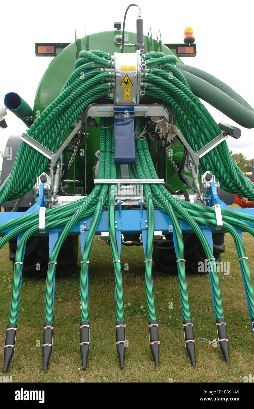 Pipes on the back of slurry spreader with injection system attached ...