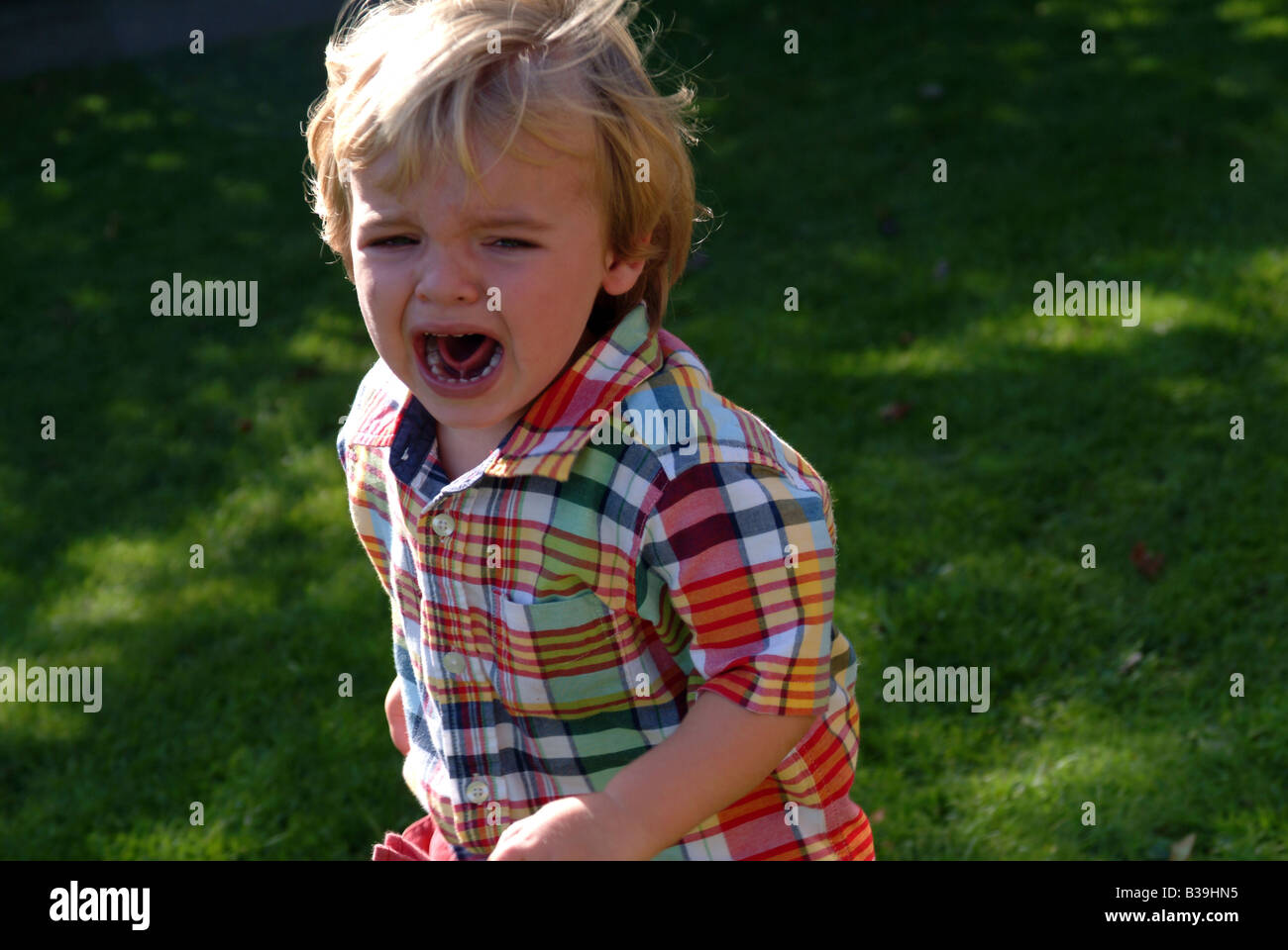 Kid running angry hi-res stock photography and images - Alamy