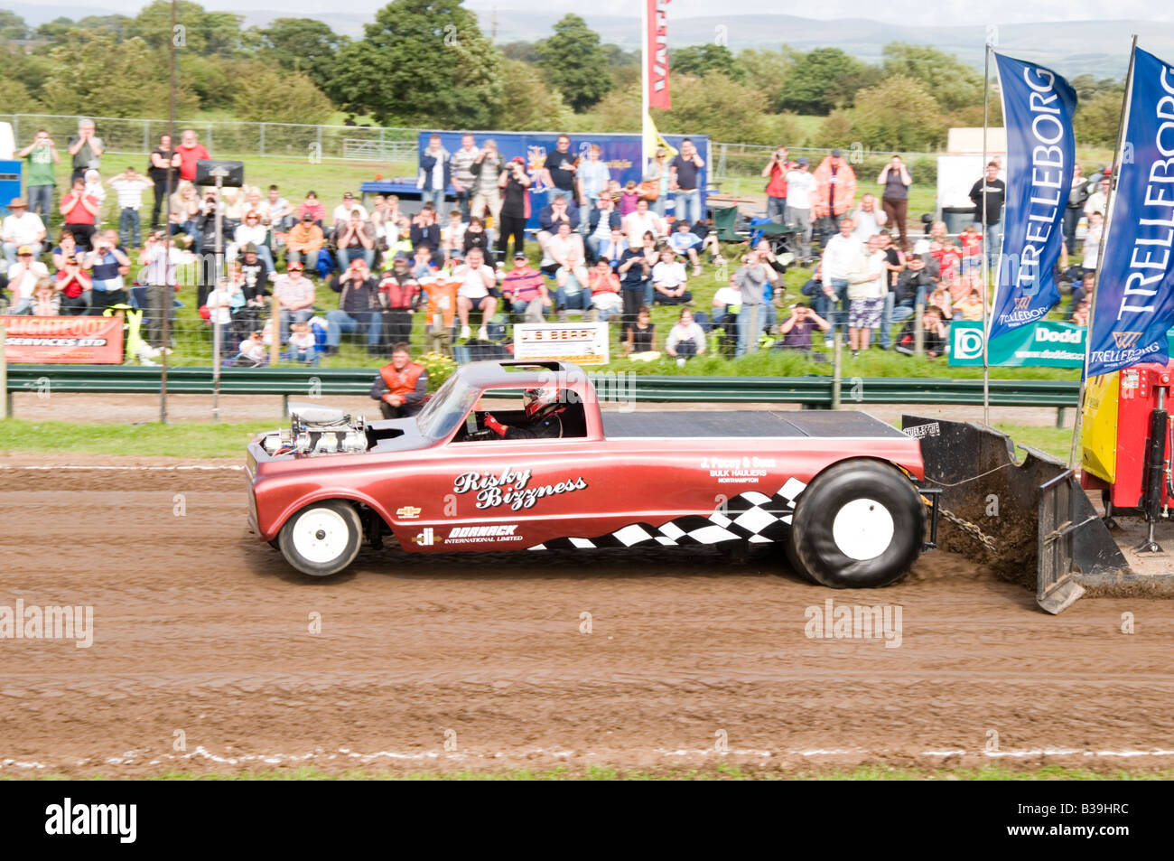 two 2 wheel drive pick up truck tractor puller Stock Photo - Alamy