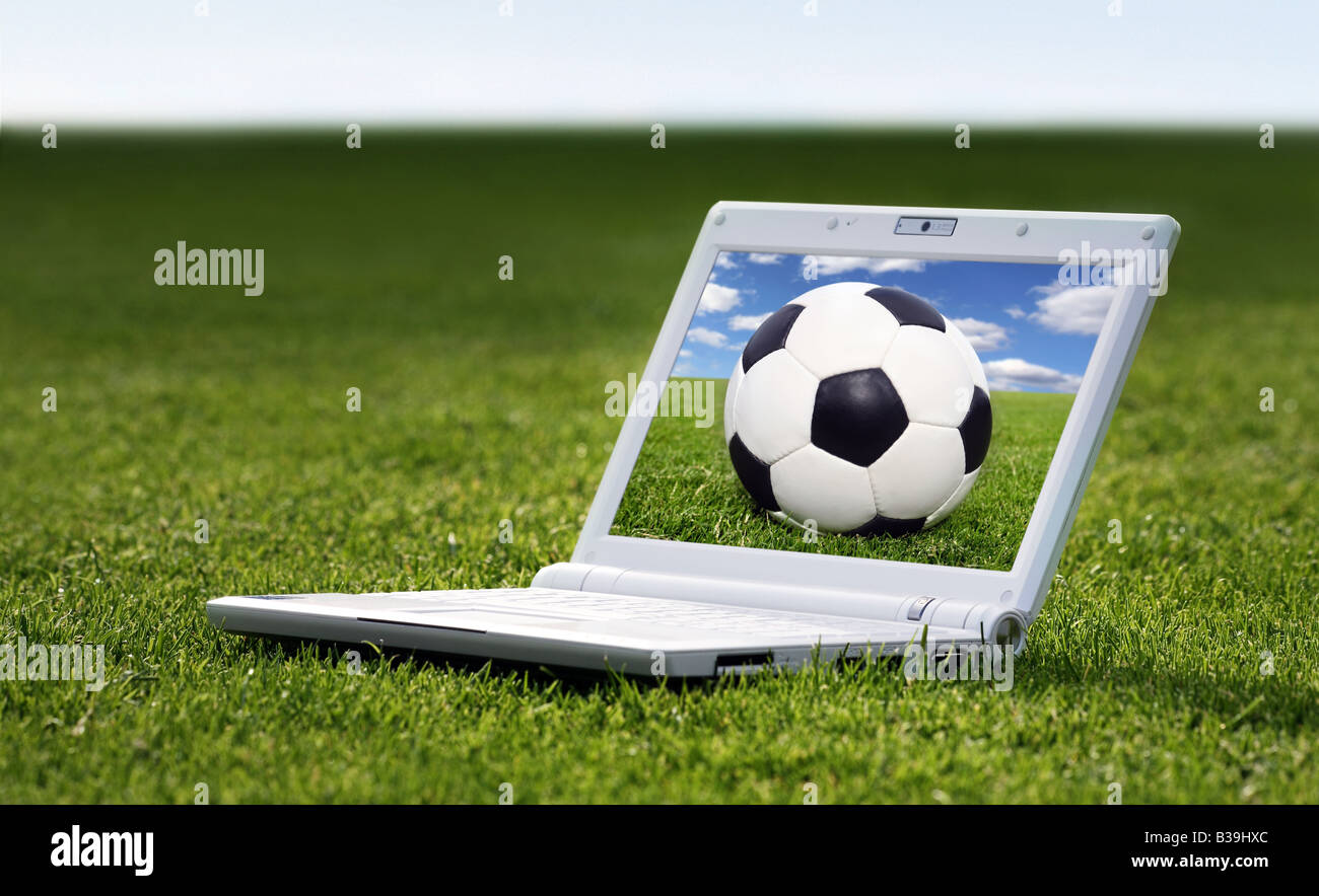 white laptop in nature Stock Photo - Alamy