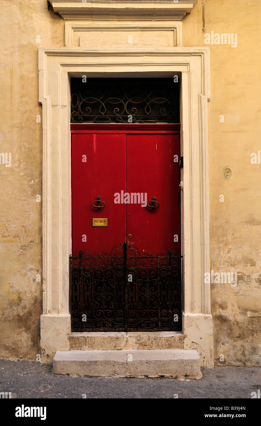 red door with rails Stock Photo - Alamy