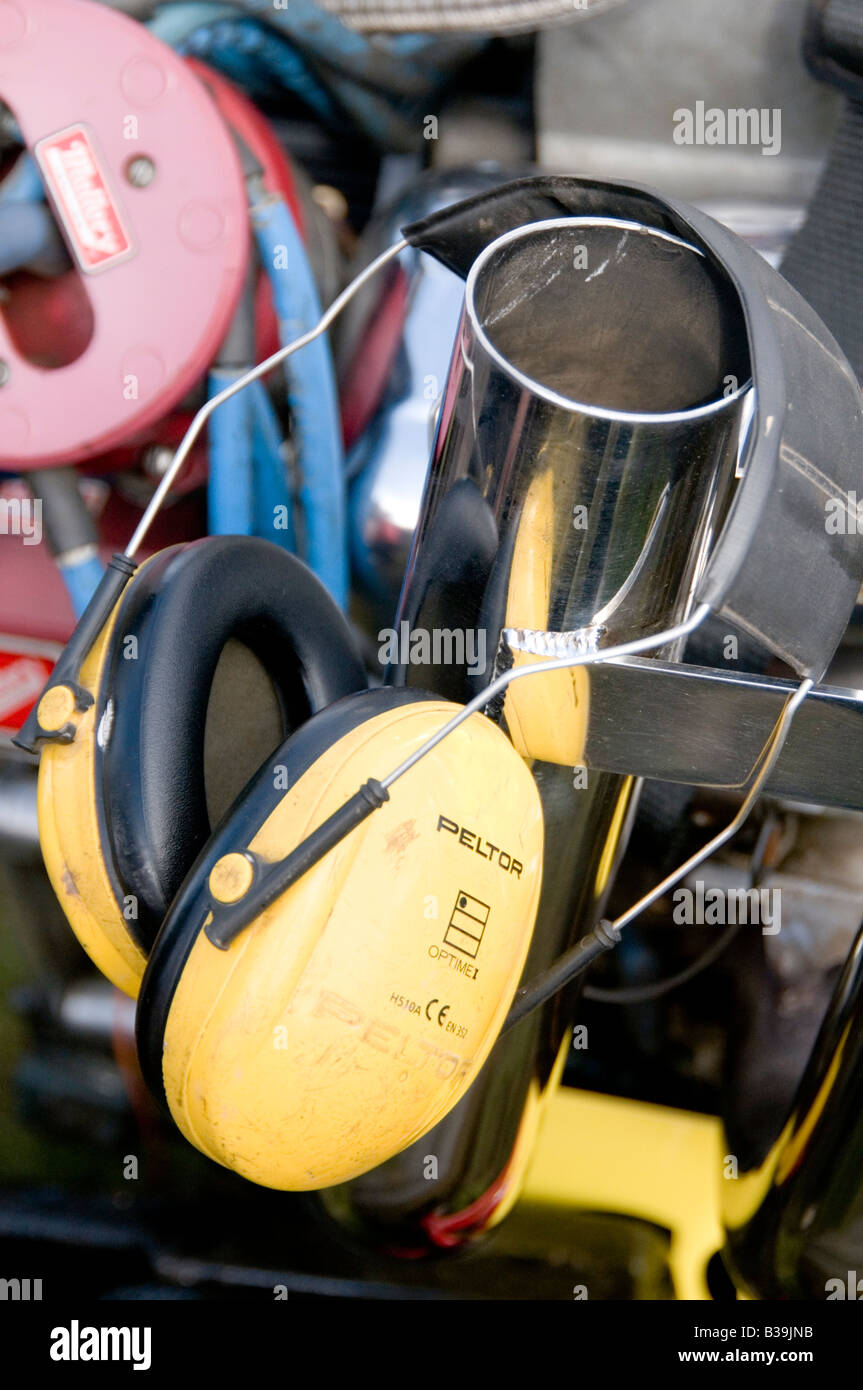 ear defenders on a racing engine Stock Photo - Alamy