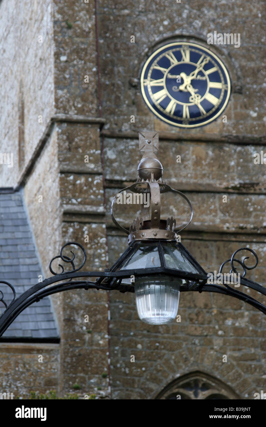 a church clock and arch Stock Photo - Alamy