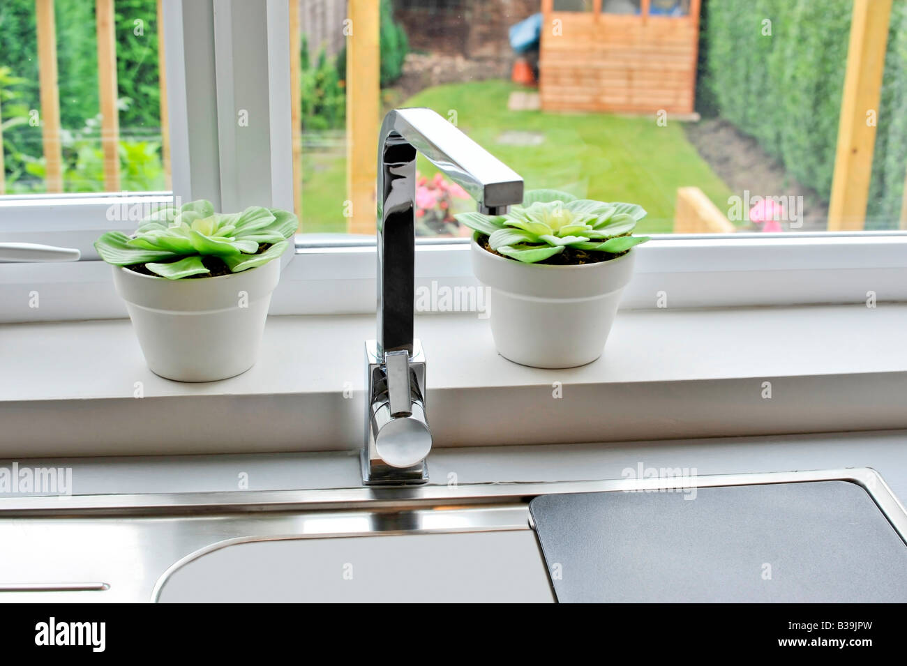 sink and tap in kitchen Stock Photo - Alamy