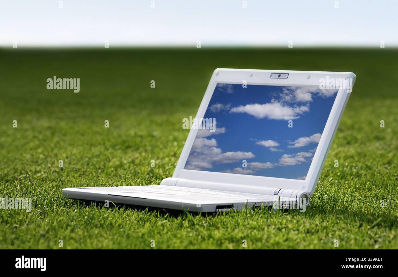 white laptop in nature Stock Photo - Alamy