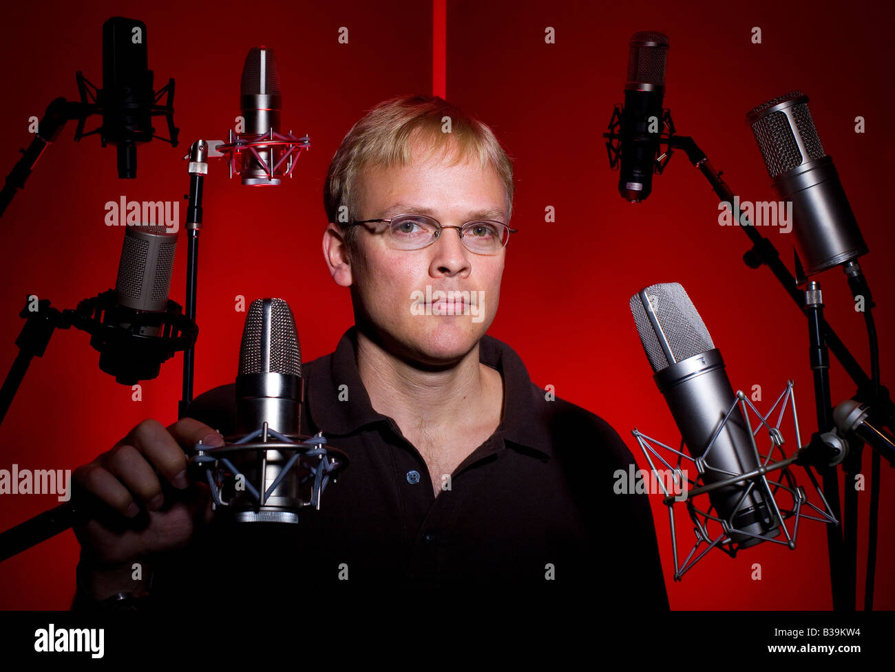 A music and sound designer in his studio in Fayetteville, Arkansas, U.S ...