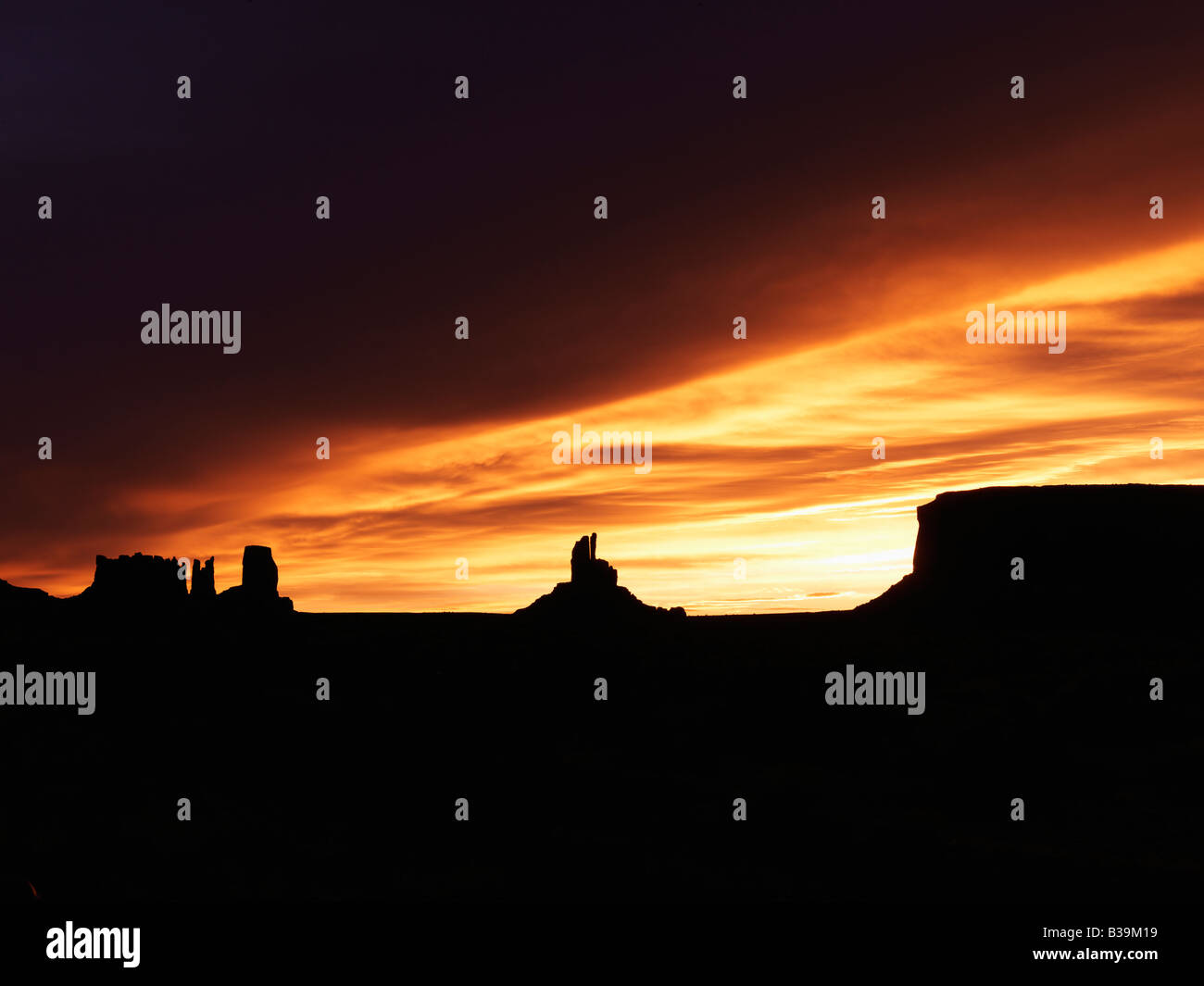 Scenic sunset landscape of mesas in Monument Valley near the border of ...
