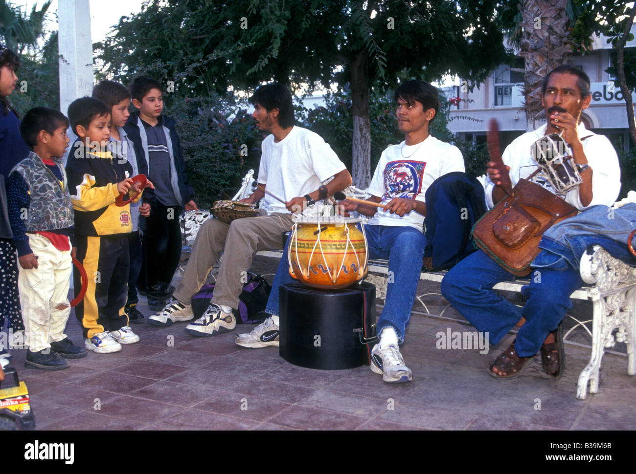 Mexicans, Mexican men, adult men, musician, musicians, playing music ...
