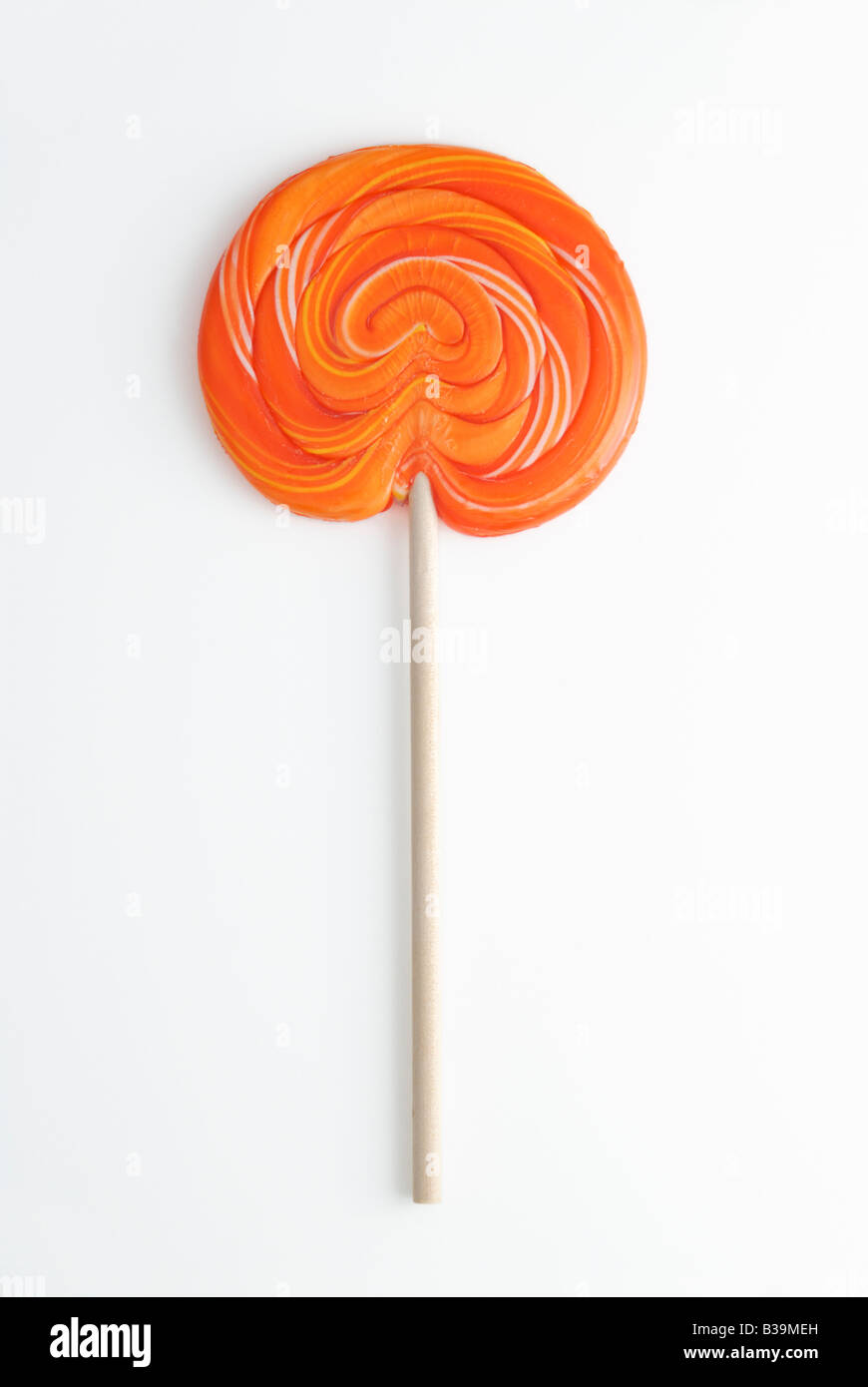 Big Orange flavored Lollipop Stock Photo - Alamy
