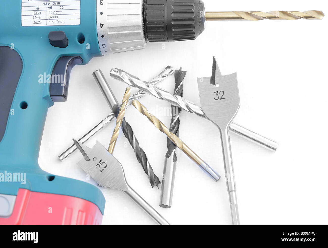 Modern cordless drill with many wood, metal and masonary bits Stock ...