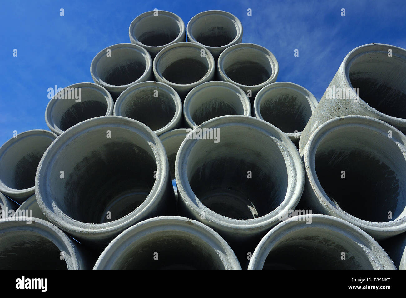 A pile of concrete pipes Stock Photo - Alamy