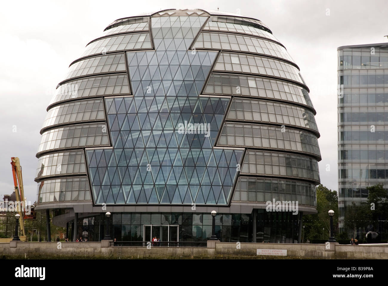 City Hall in London, England. The modern glass facaded building is the ...
