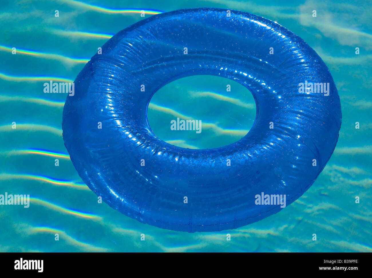Inflatable ring in a swimming pool Stock Photo - Alamy