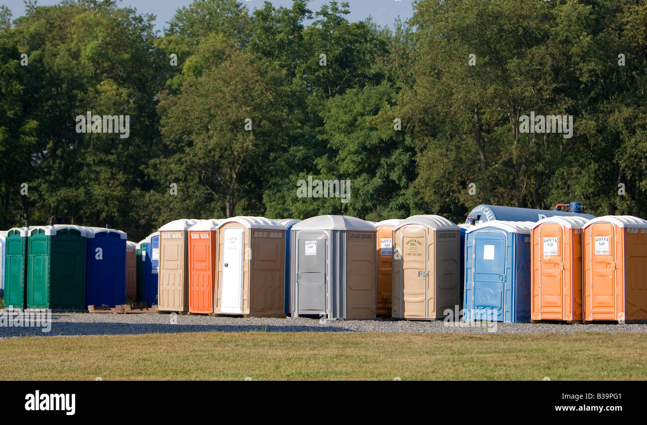 Row of portable toilets Stock Photo - Alamy