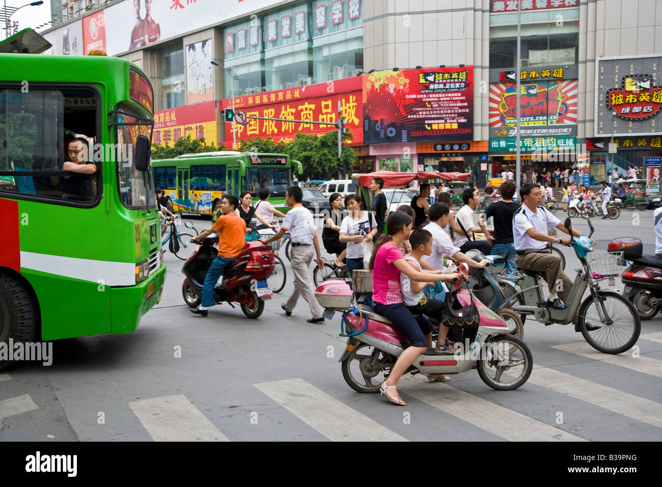 Bus and cycles at rush hour at a busy intersection of Daye Road and ...