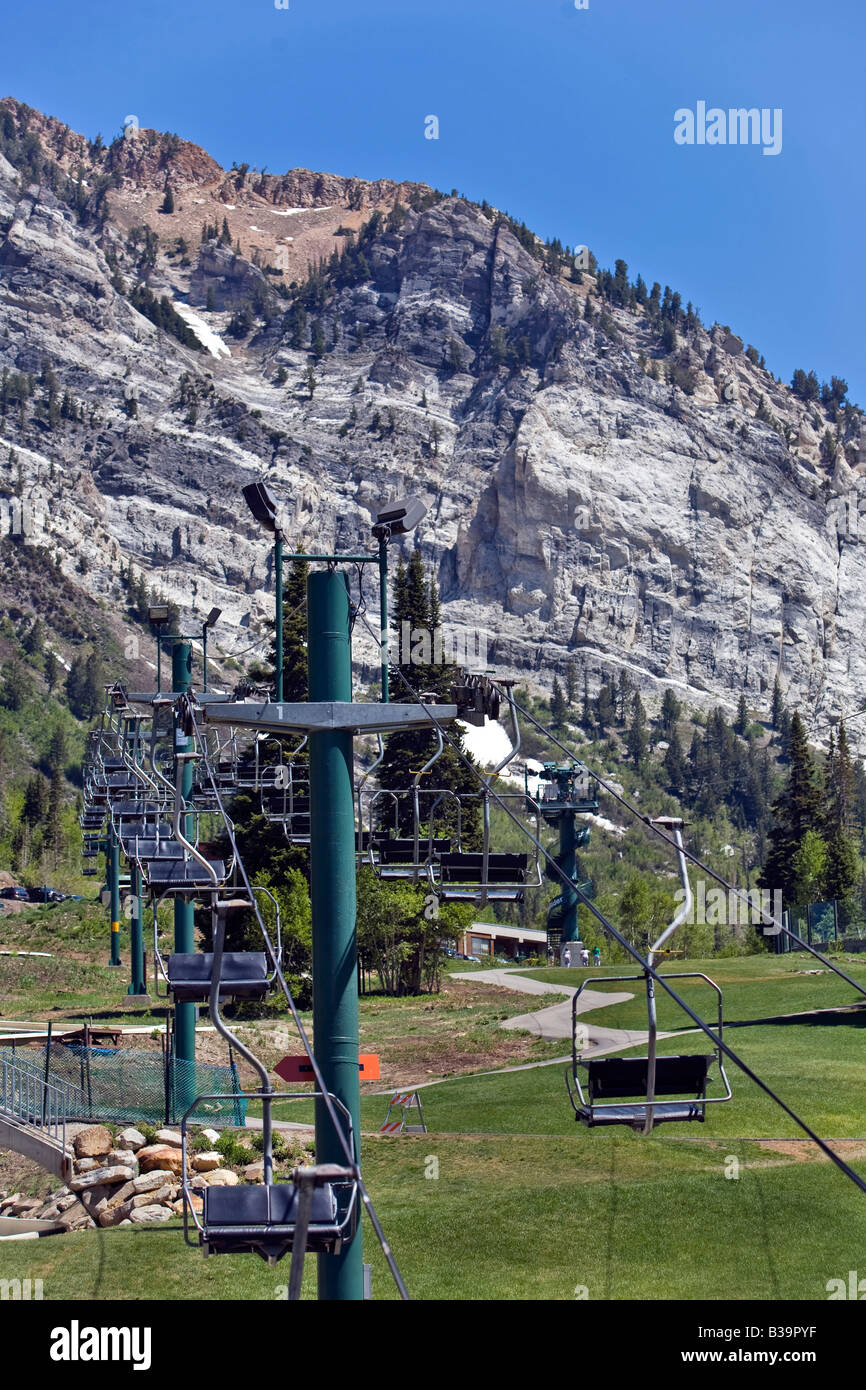 Passenger ski lifts at Snowbird in Wasatch Mountain Utah.Empty chairs ...