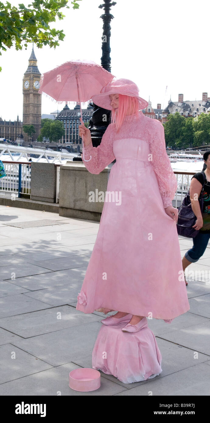 Pink female Street performer on the Southbank in London Stock Photo - Alamy